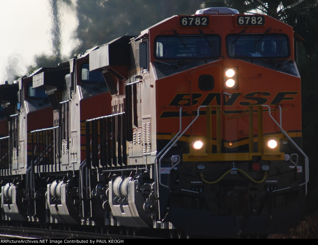 The Exhaust Gases Shimmer in the late afternoon off BNSF 6782 and the rest of the Locomotive ...
